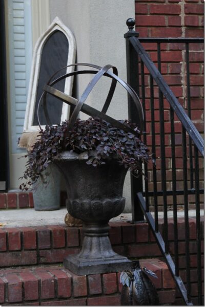 Give your garden an instant facelift using metal spheres in outdoor ...